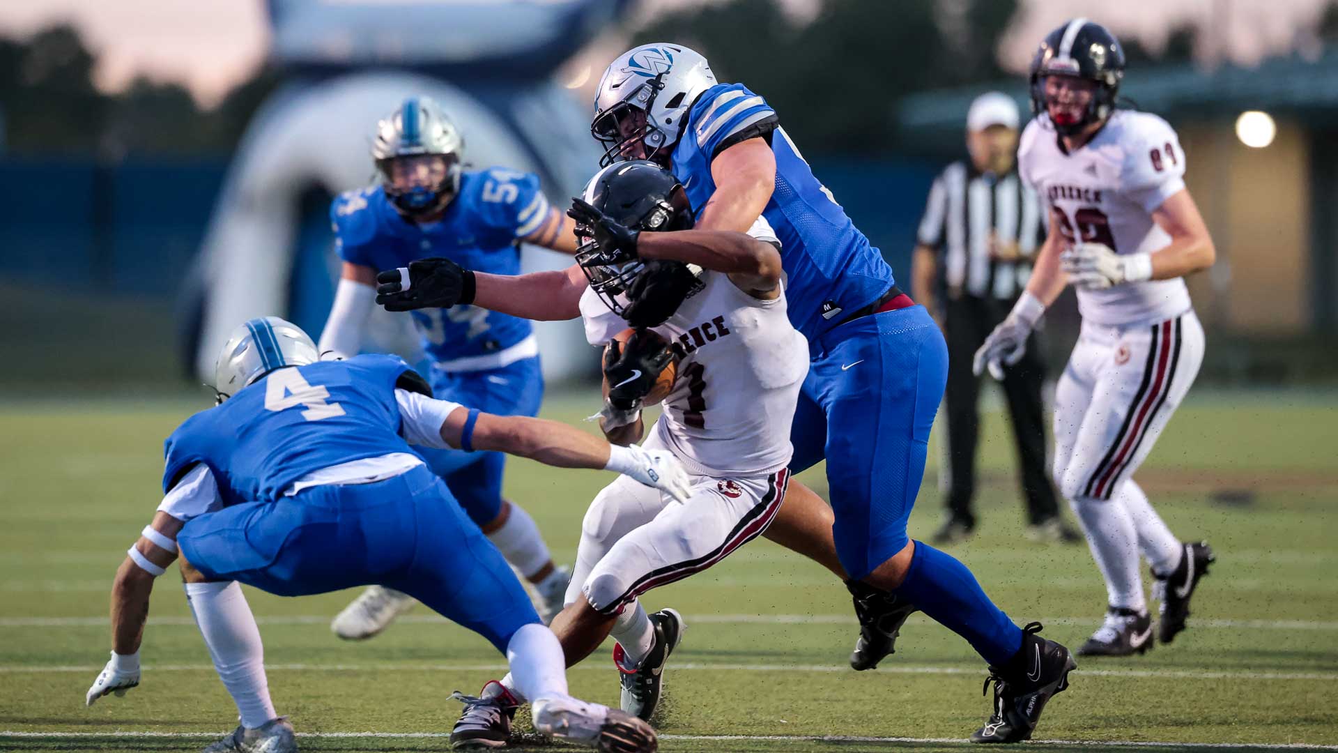 Lawrence football sees 2-TD lead slip away late in 35-31 road loss ...